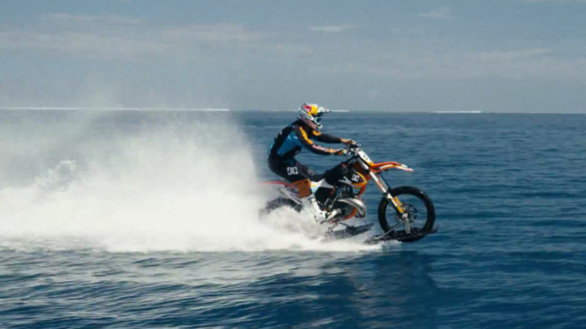 Robbie Maddison rides his bike on water