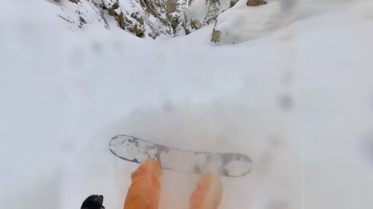 Look: Snowboarder Gets Swept Away By Snow On Steep Terrain