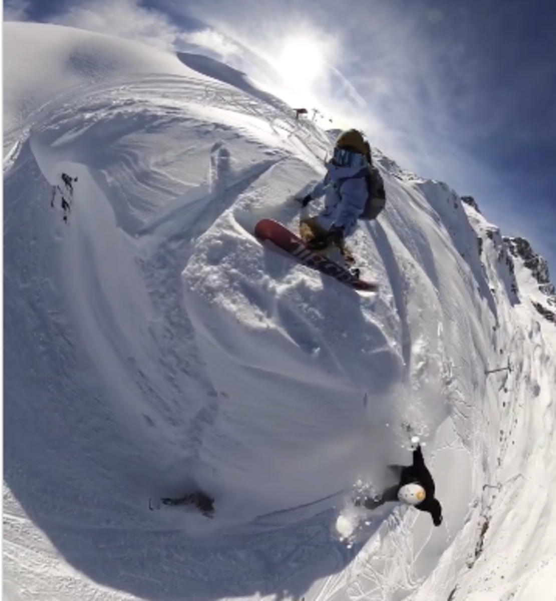Watch: Snowboarders Accidentally Launch Off Cliff