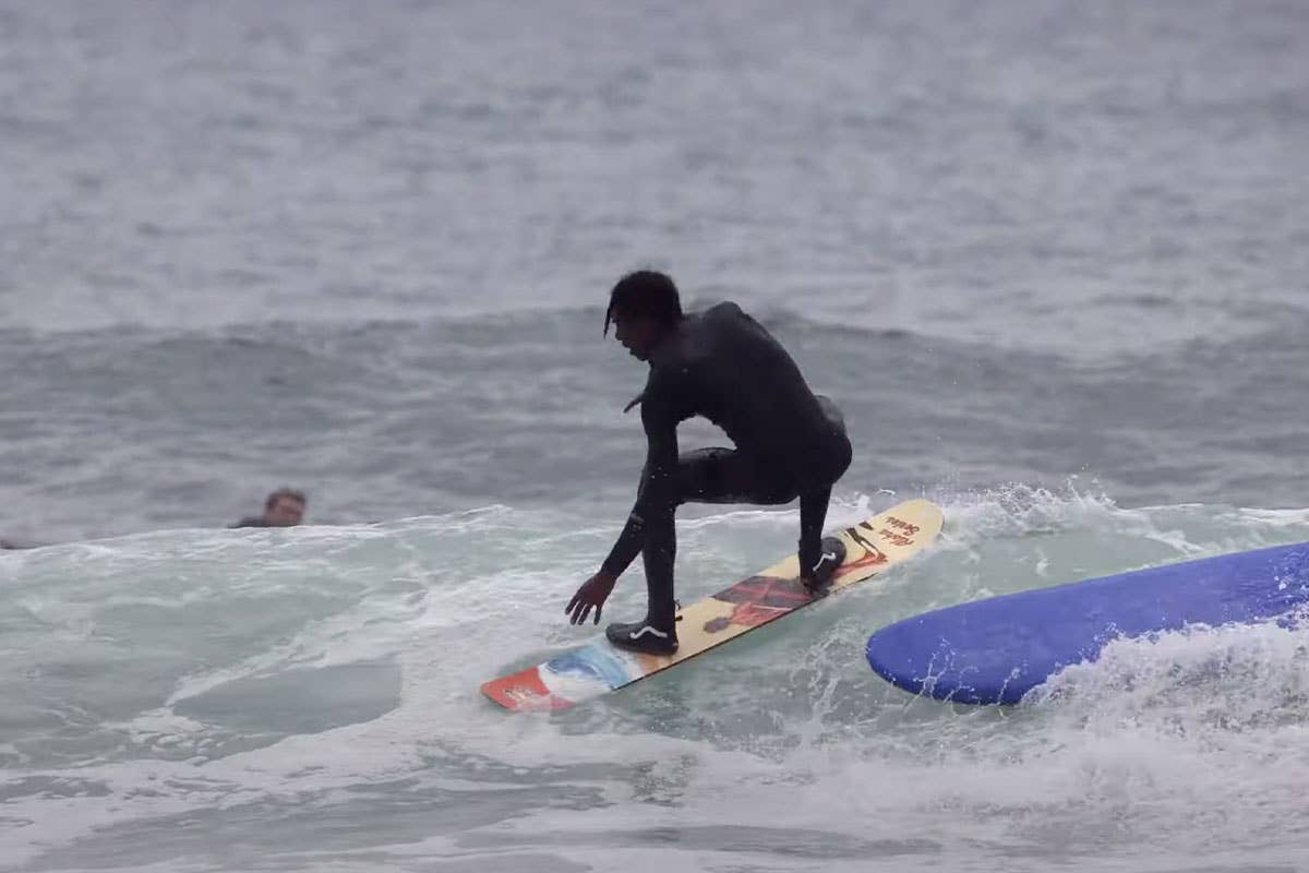 The Real Johnny Tsunami: Surfer Shreds a Wave on a Snowboard - Snowboarder
